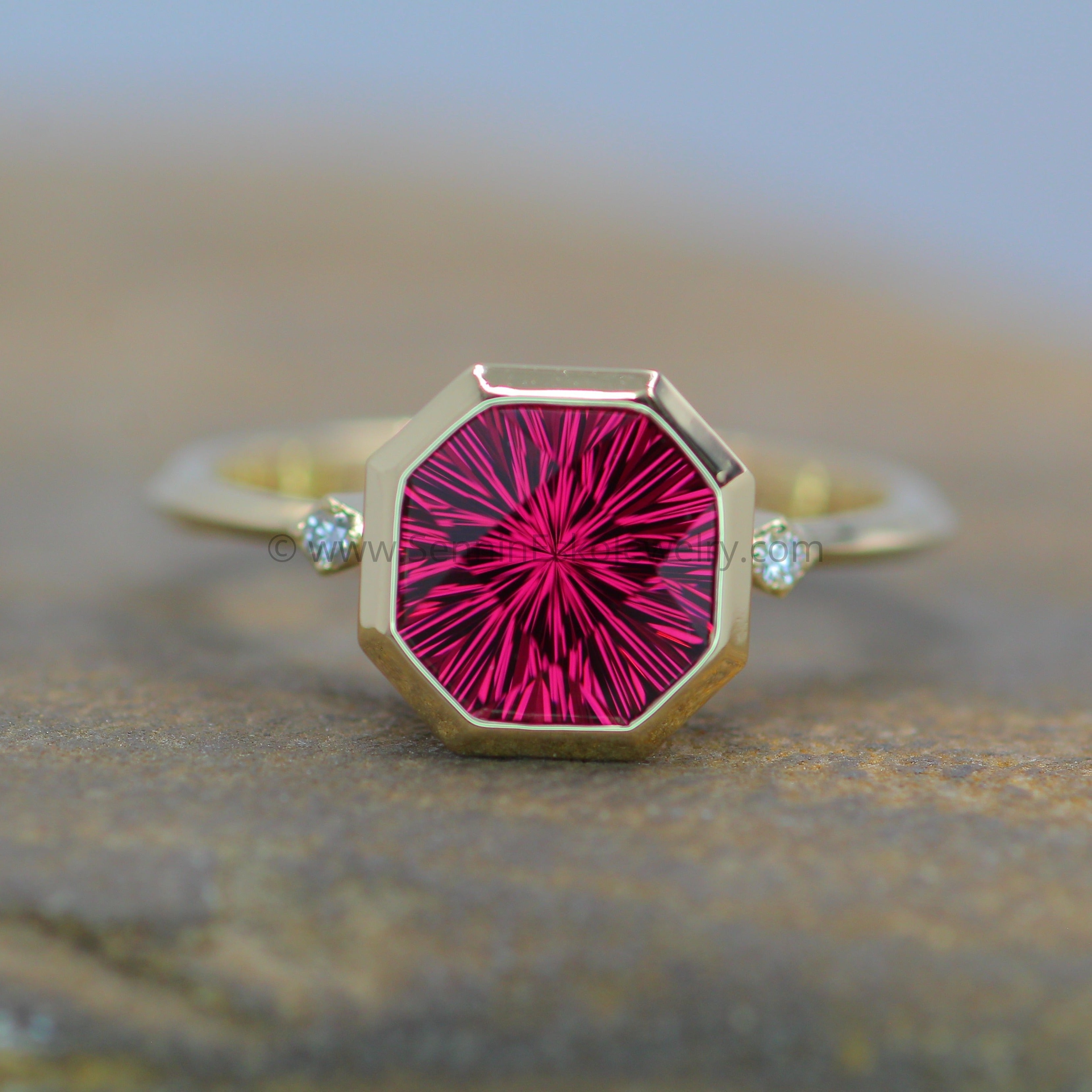 Knife Edge Bezel Set Ring with Small Diamond Accents - Depicted with a ...